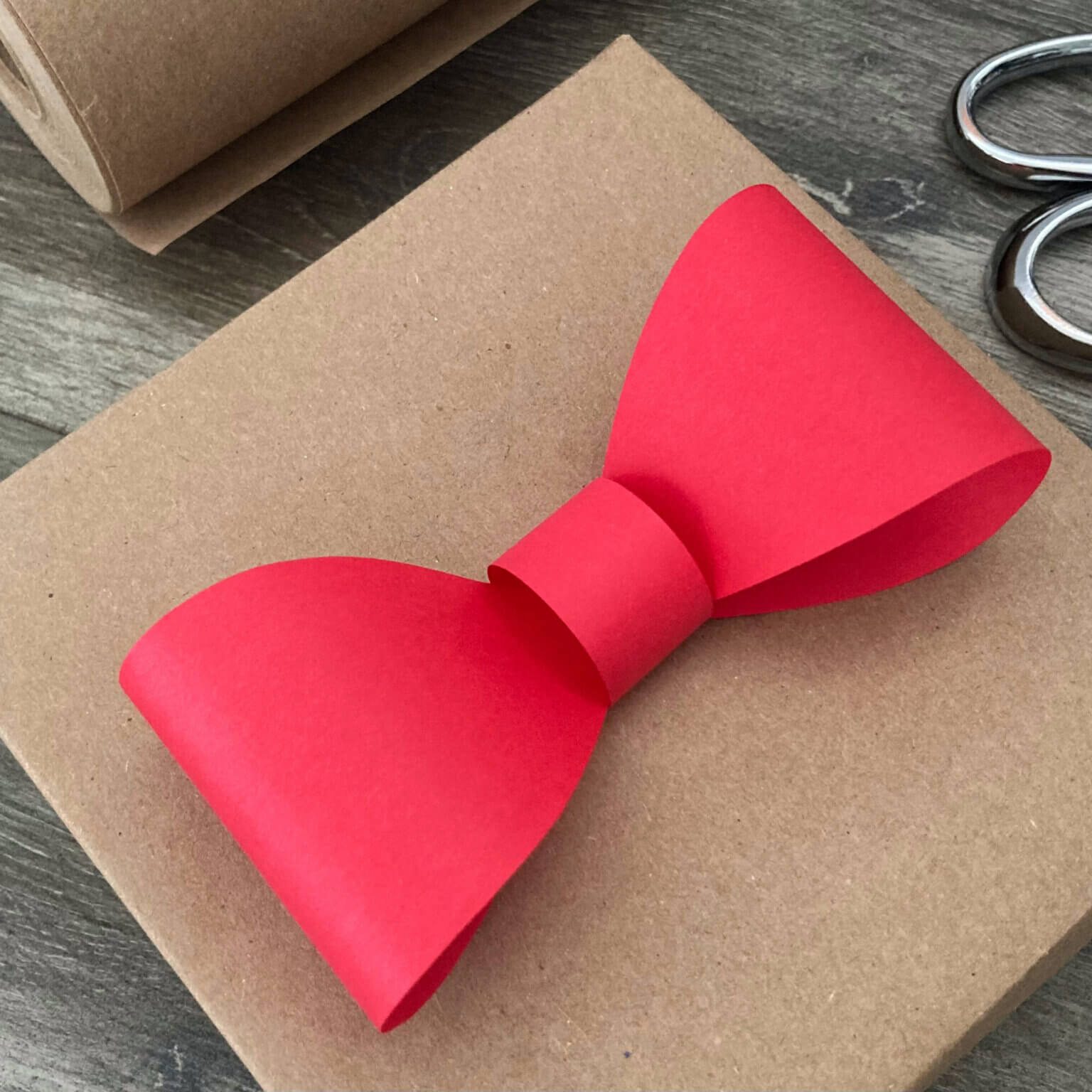 How To Make A Simple Paper Bow - Gift Wrapping Love